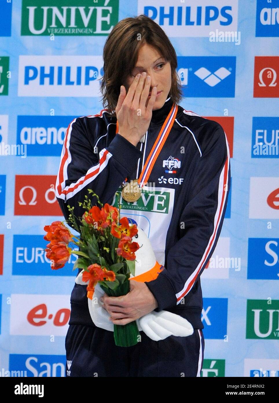 France's Aurore Mongel celebrates on the podium her gold medal after ...