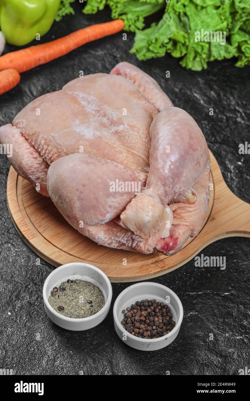Raw whole chicken hi-res stock photography and images - Alamy