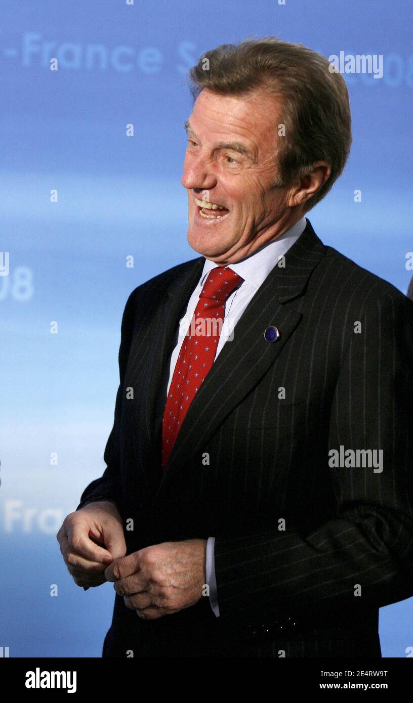 Bernard Kouchner poses during a joint press conference at the Emirates ...