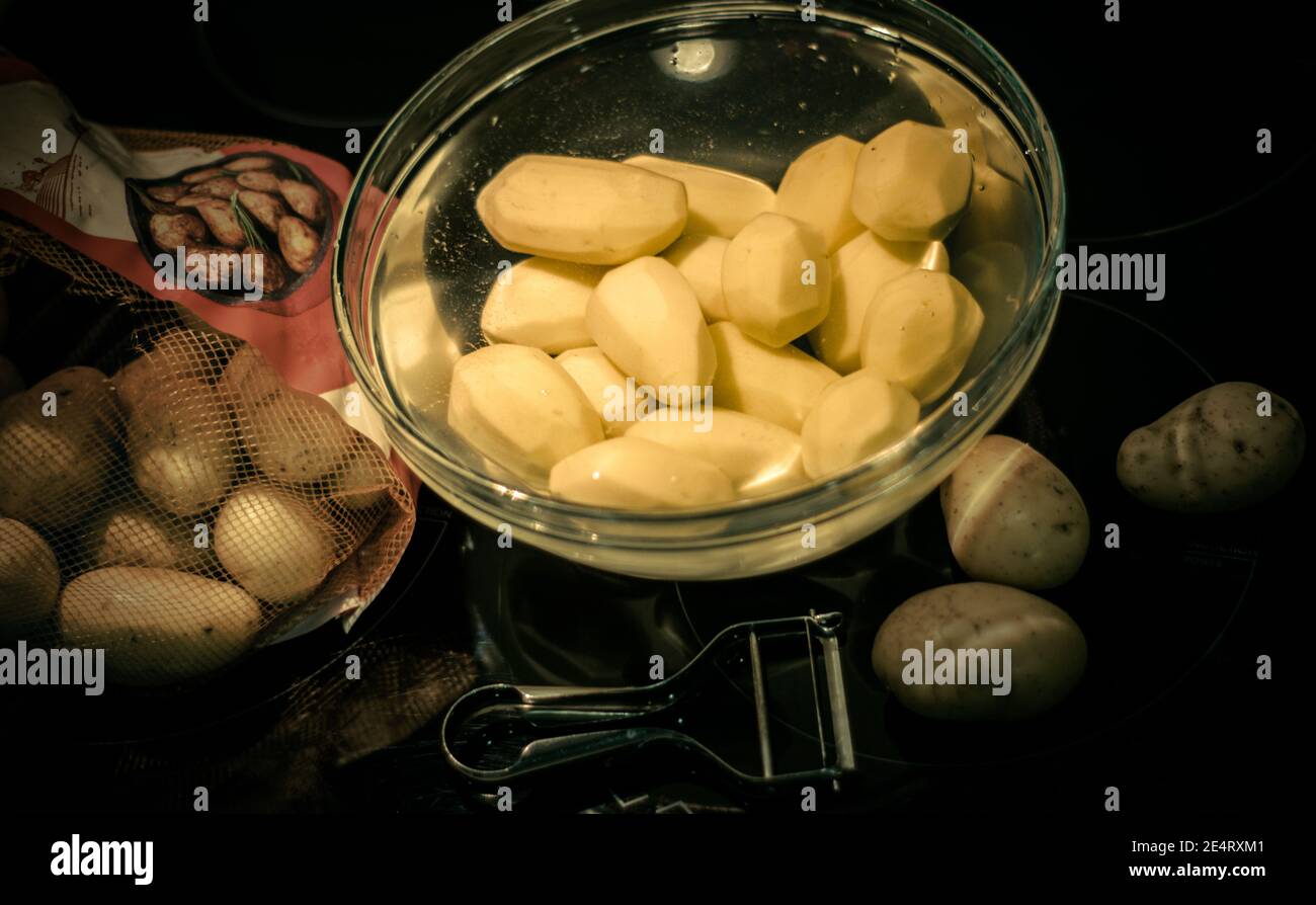 Potatoes used in kitchen for food preparation, peeled potatoes Stock ...