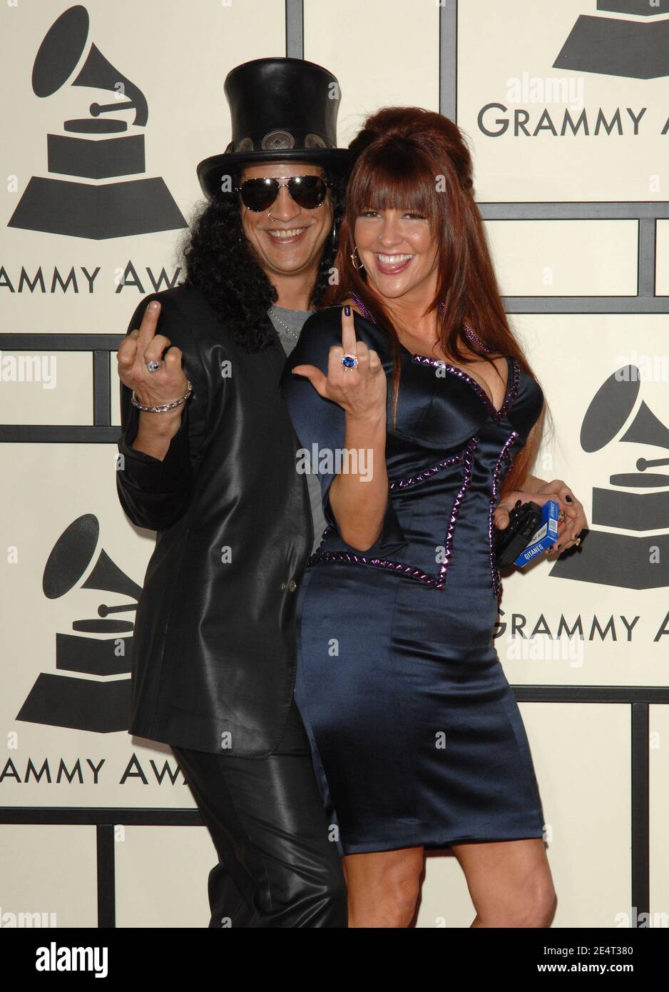 Slash and Perla Ferrar attend the 50th Annual Grammy Awards held at the ...