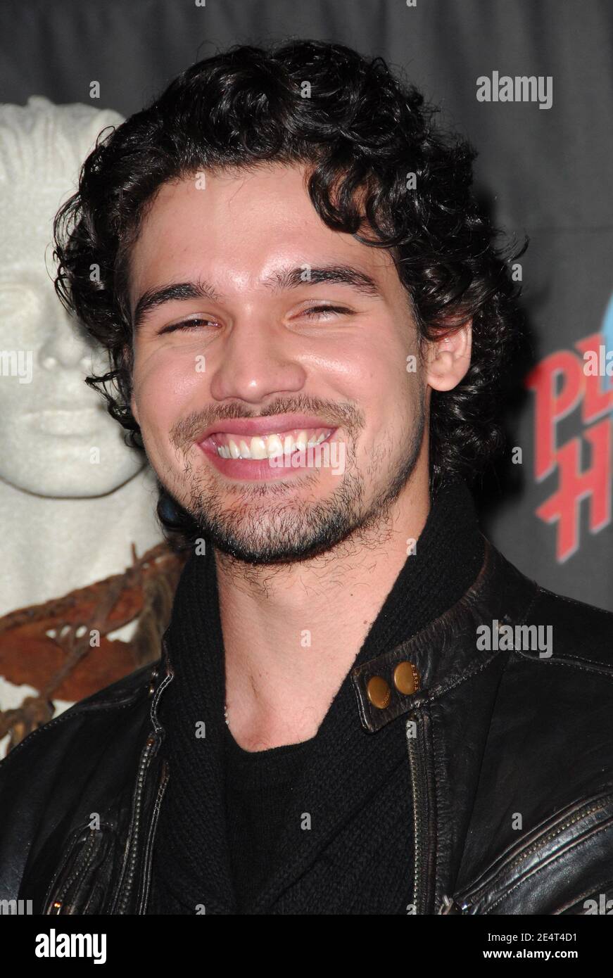 Actor Steven Strait poses as he donates costumes from his upcoming film ...