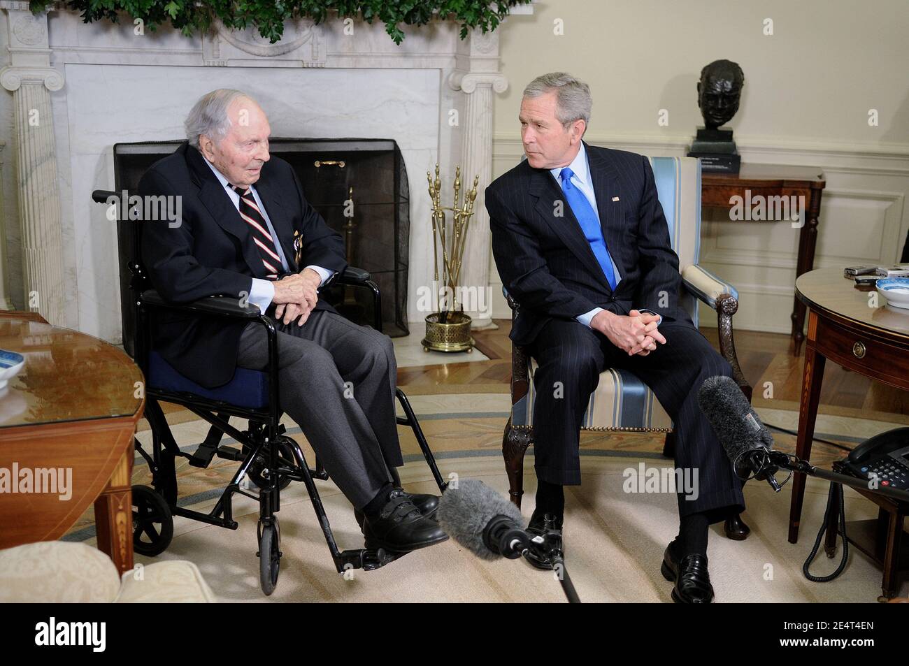 President George W. Bush participates in a photo op with Corporal Frank ...