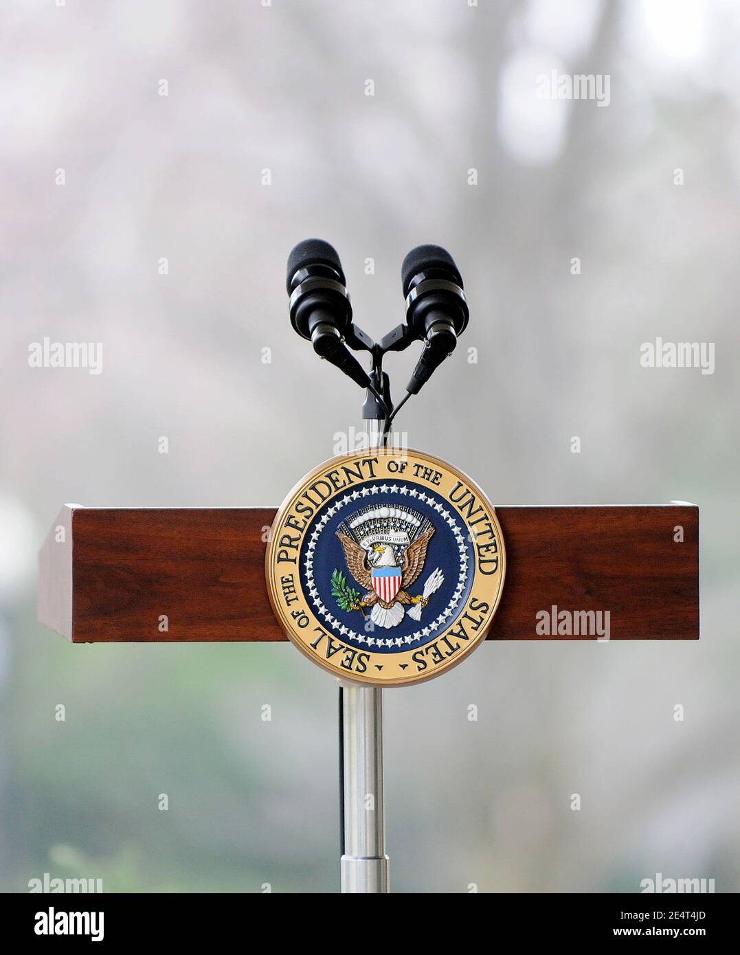 A podium with the seal of the President Of the United States stands ...