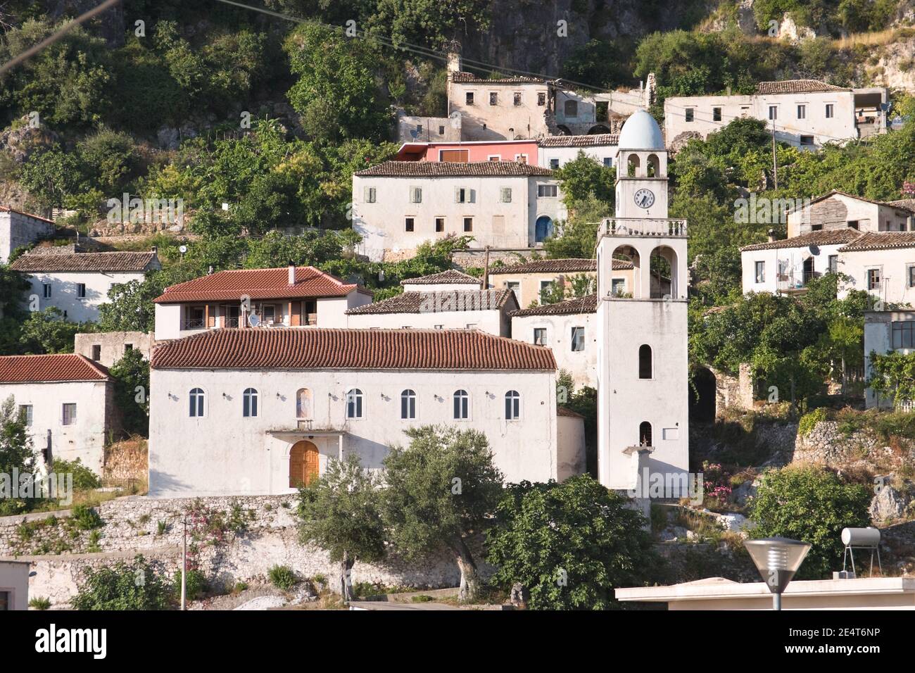 white church in the village of Dhermi, Albania Stock Photo - Alamy