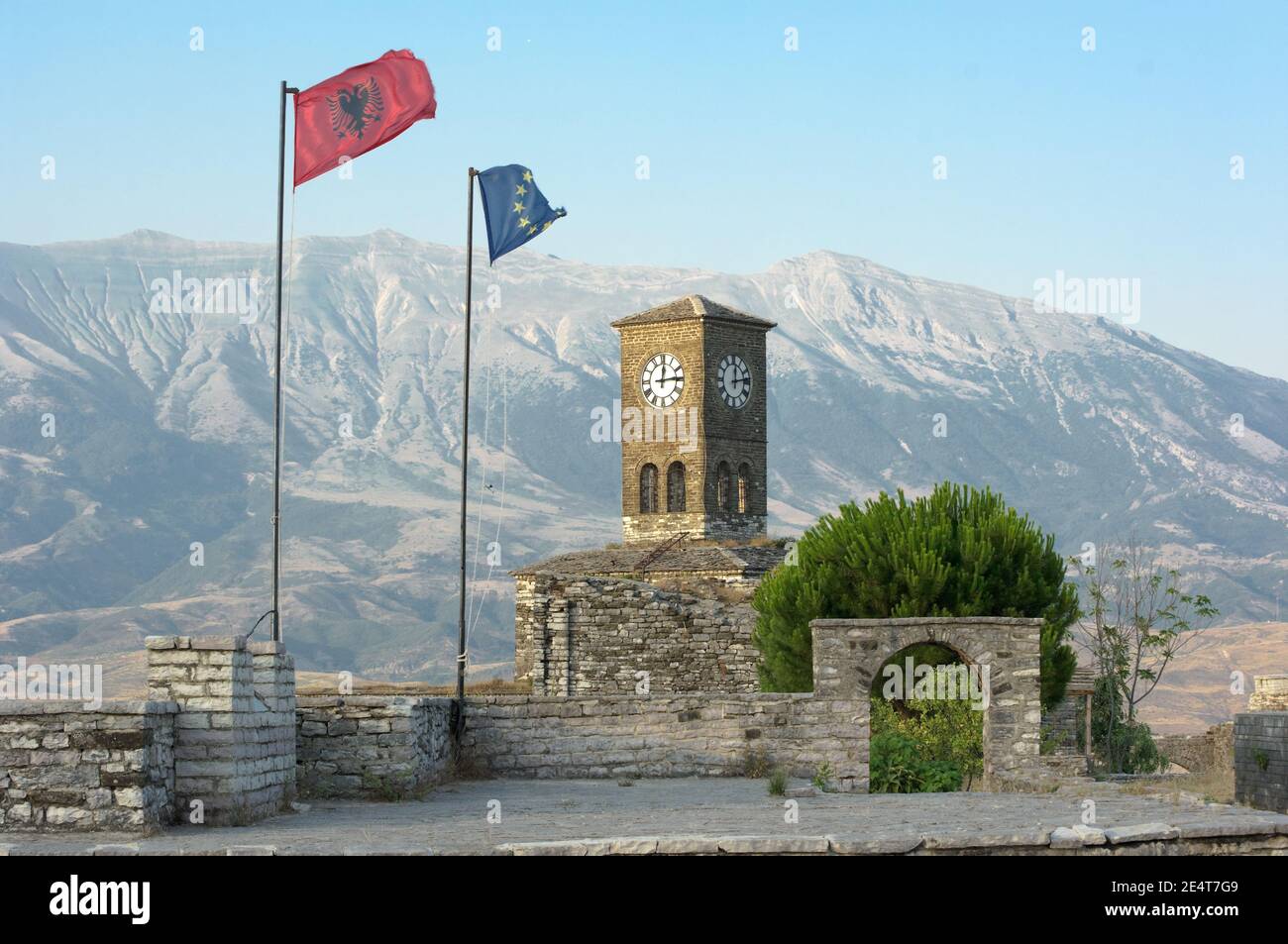 Clock Tower and Albanian Flag on the Gjirokaster Castle, Albania Stock ...