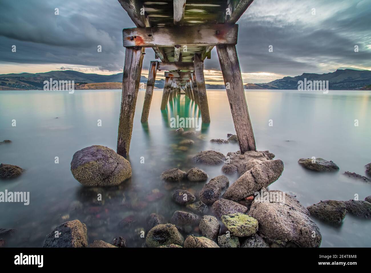 Under a pier over the lake Stock Photo - Alamy