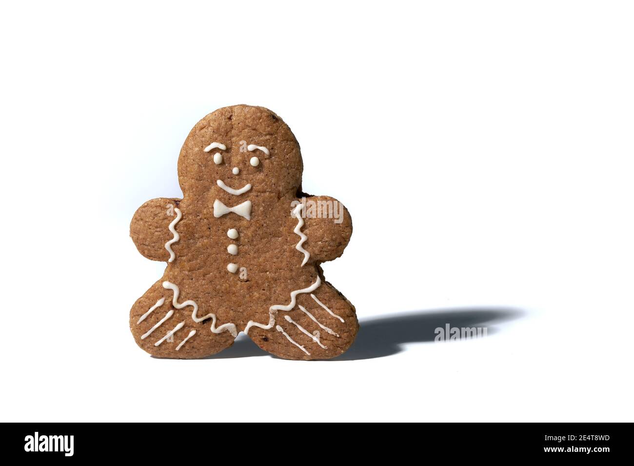 Standing gingerbread man with shadow isolated on white background Stock ...