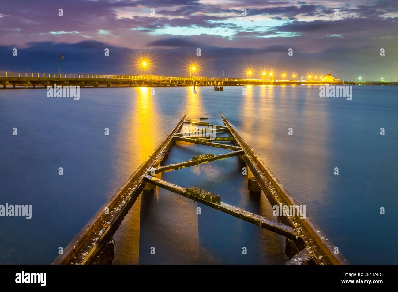 Old wharf on st Kilda beach Stock Photo - Alamy