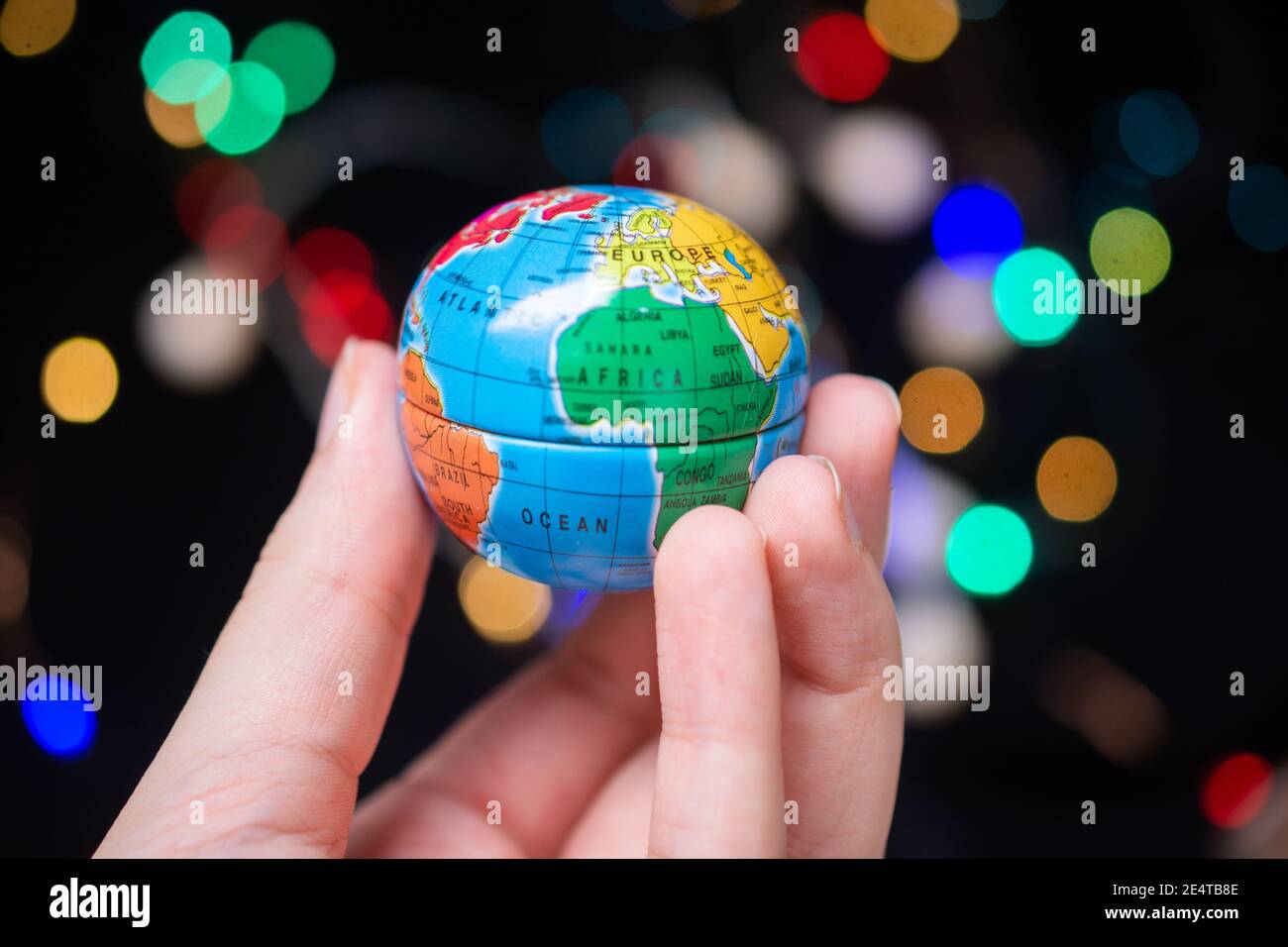 World globe model in hand. Global business and ecology concept Stock ...