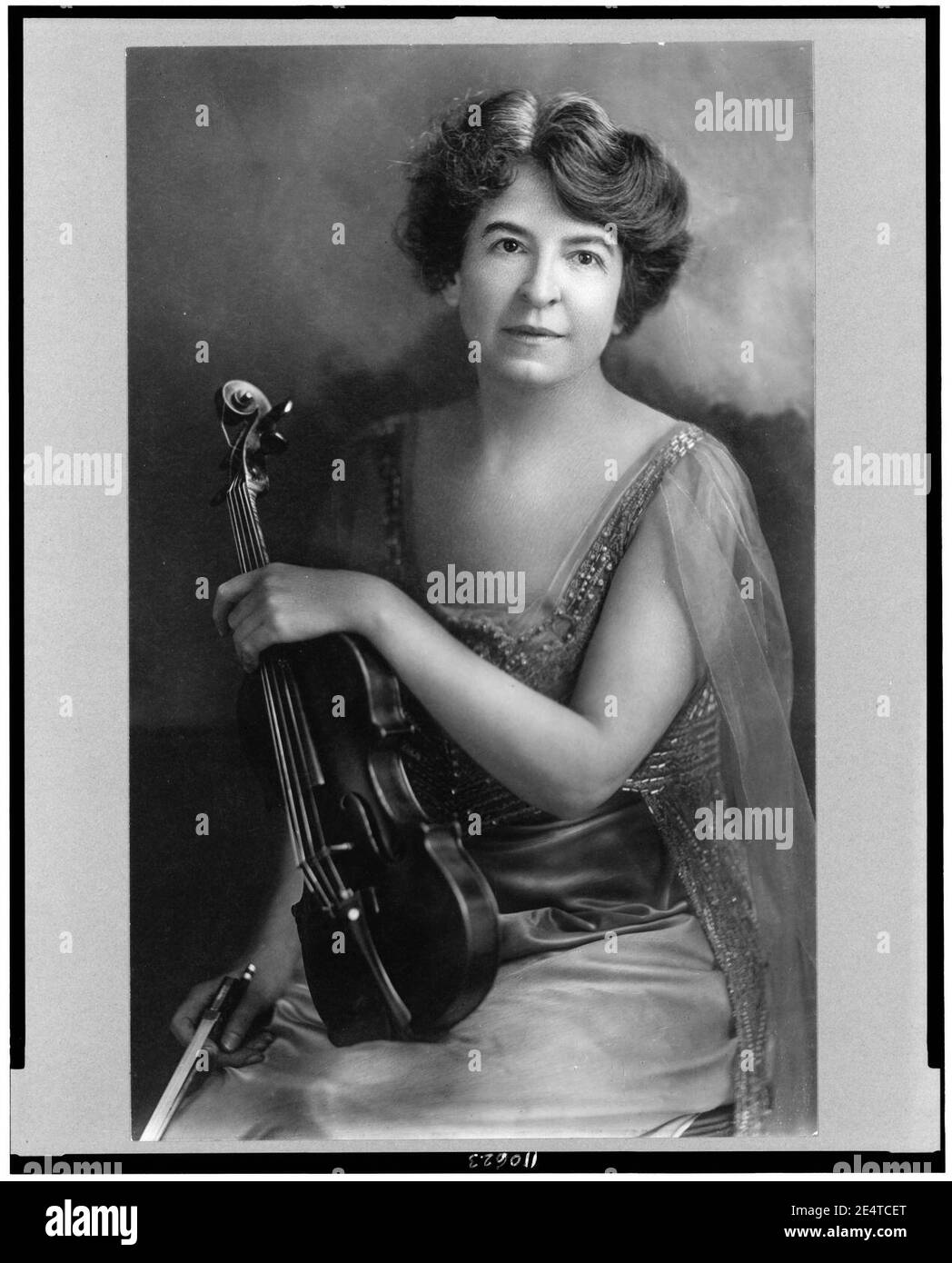 Maud Powell, three-quarter length portrait, seated, facing front ...