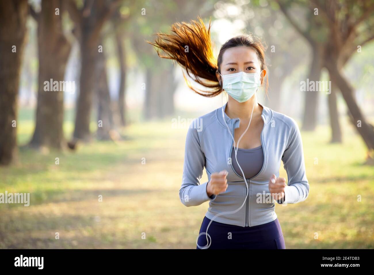 Running in mask hi-res stock photography and images - Alamy