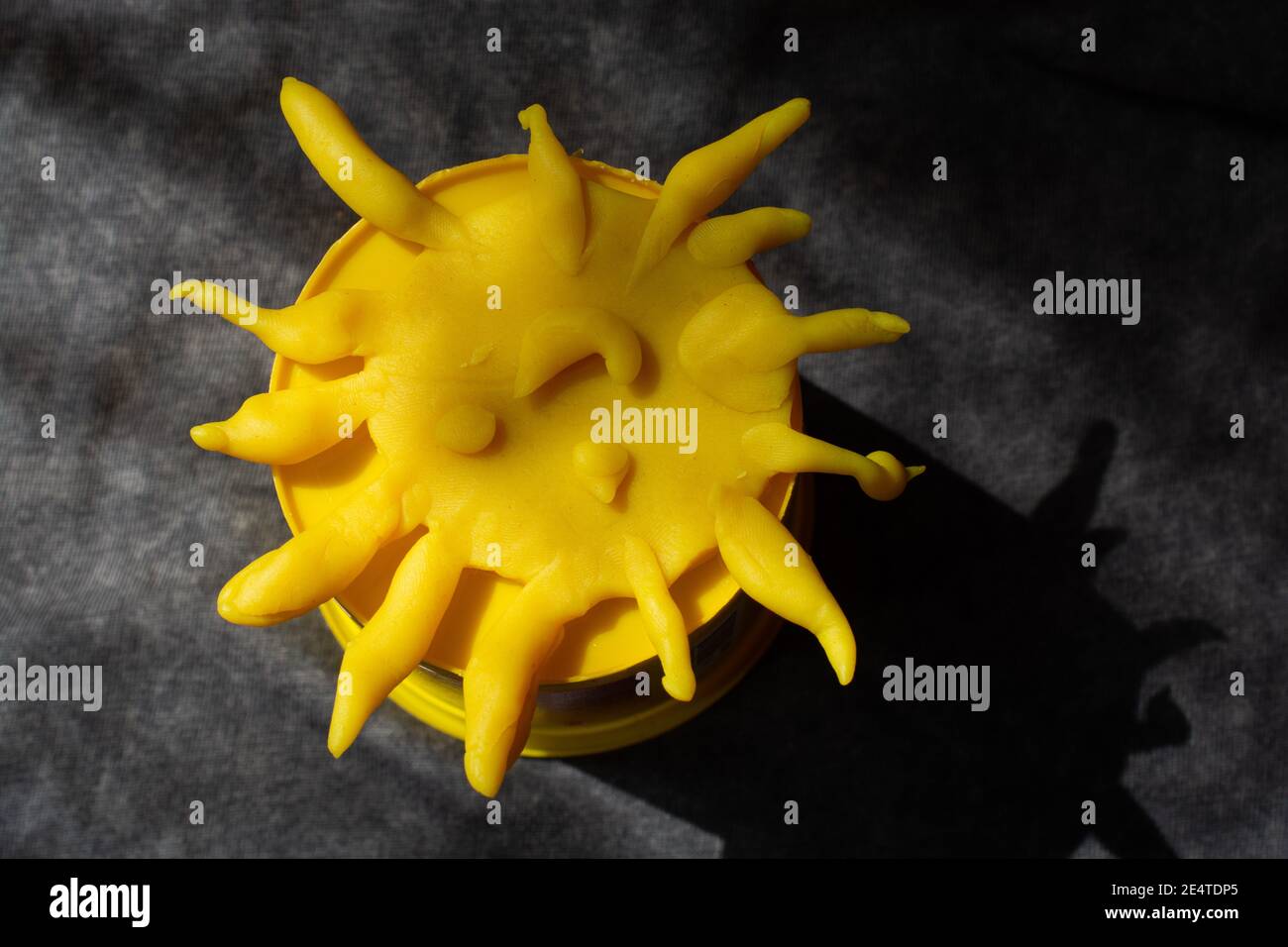 the yellow sun made by plasticine Stock Photo - Alamy