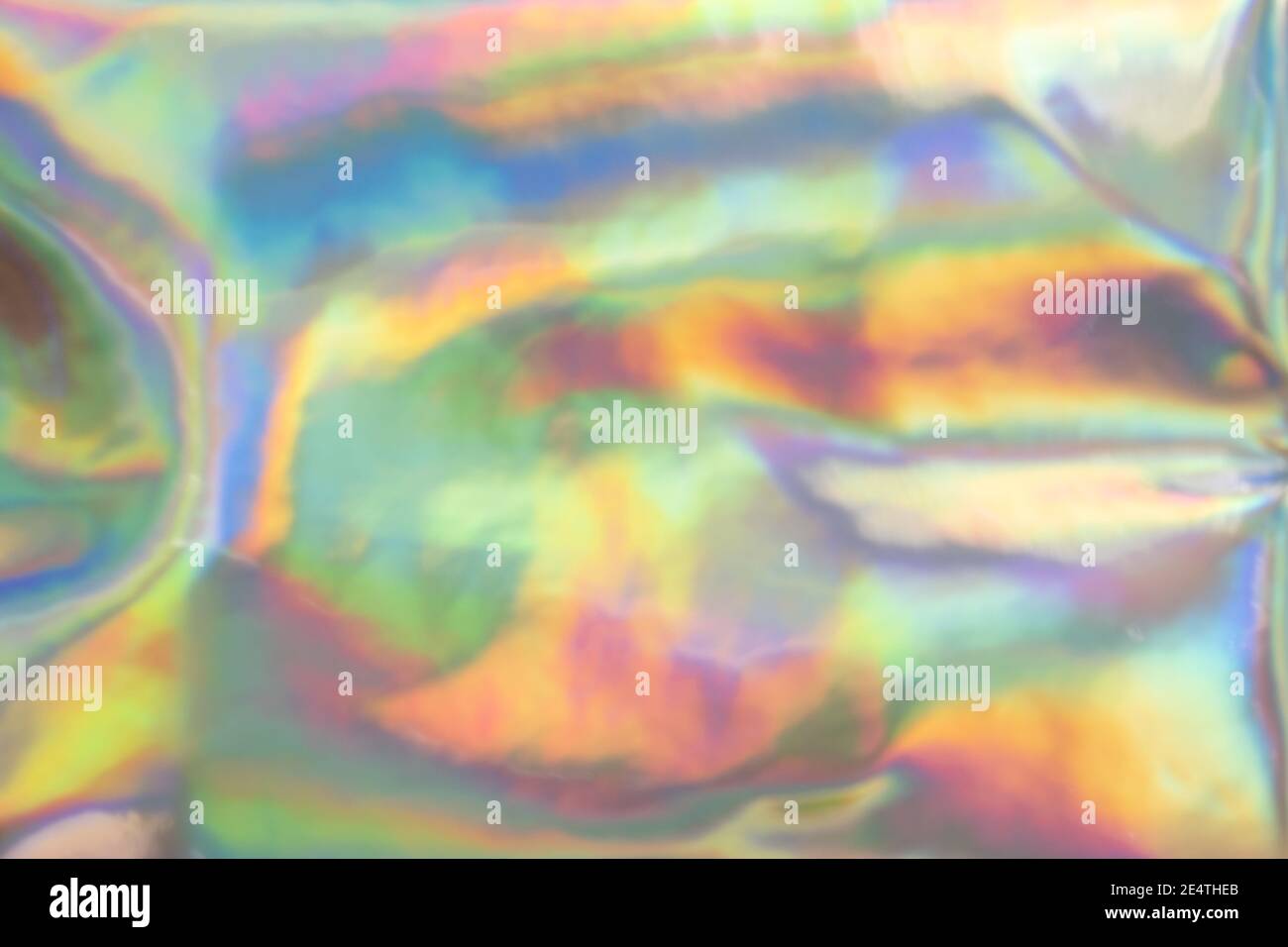 Iridescent neon defocused background. Holographic wrinkled abstract ...