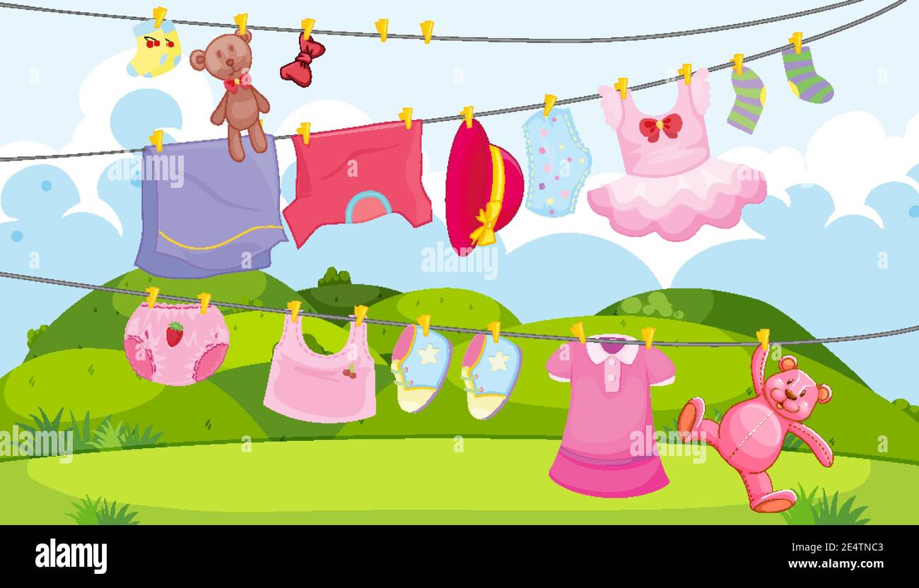 Children clothes on a clothesline with children accessories in the ...