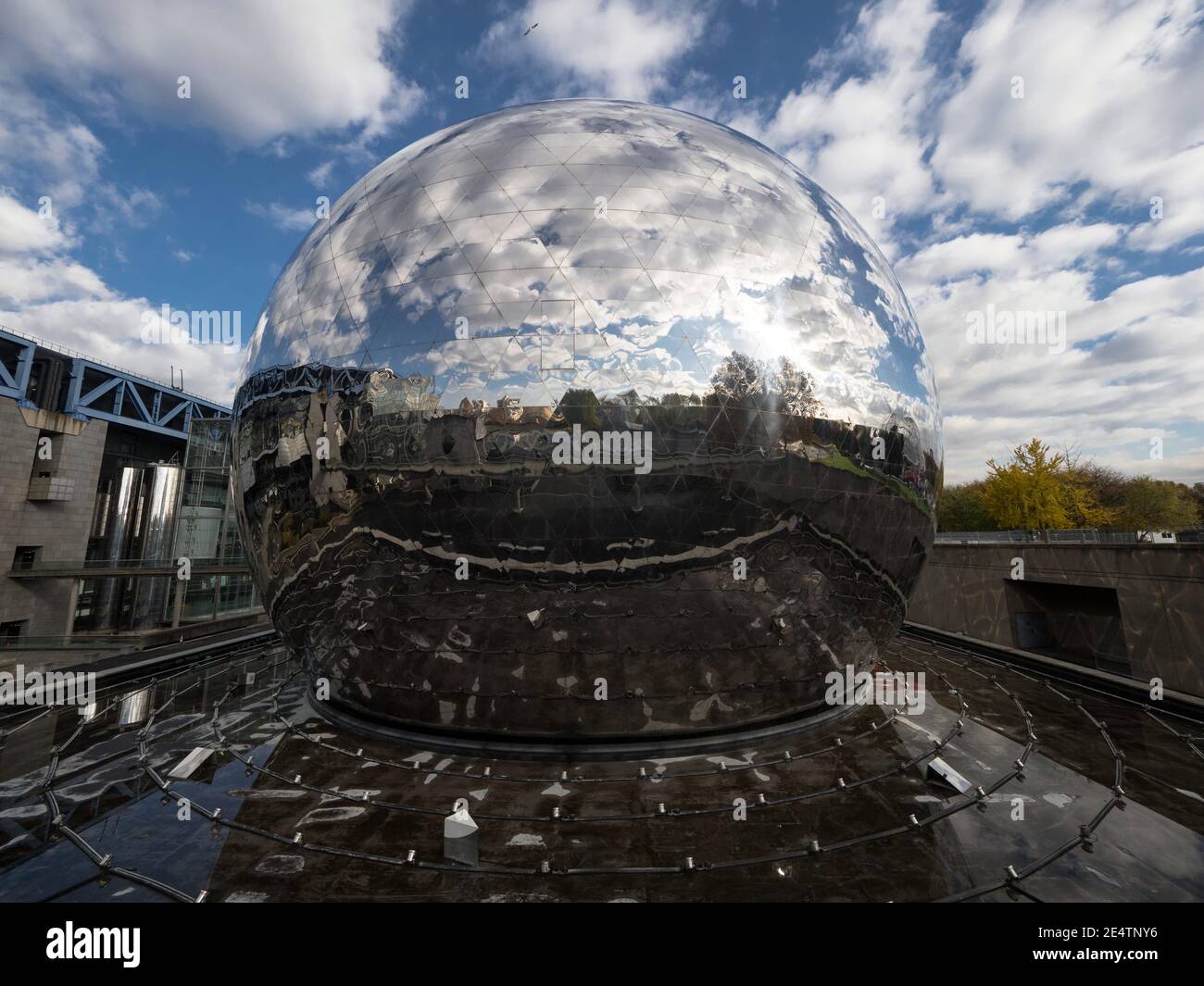 Mirror reflection of La Geode sphere ball geodesic dome round museum ...