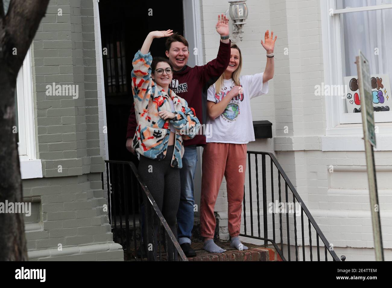 People waves as the motorcade carrying President Joe Biden, leaves the ...