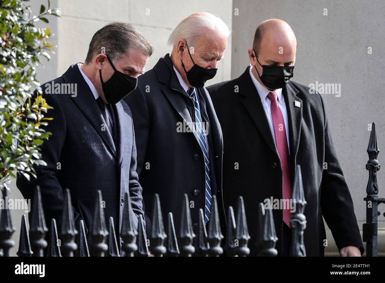 United States President Joe Biden, center, leaves the Holy Trinity ...