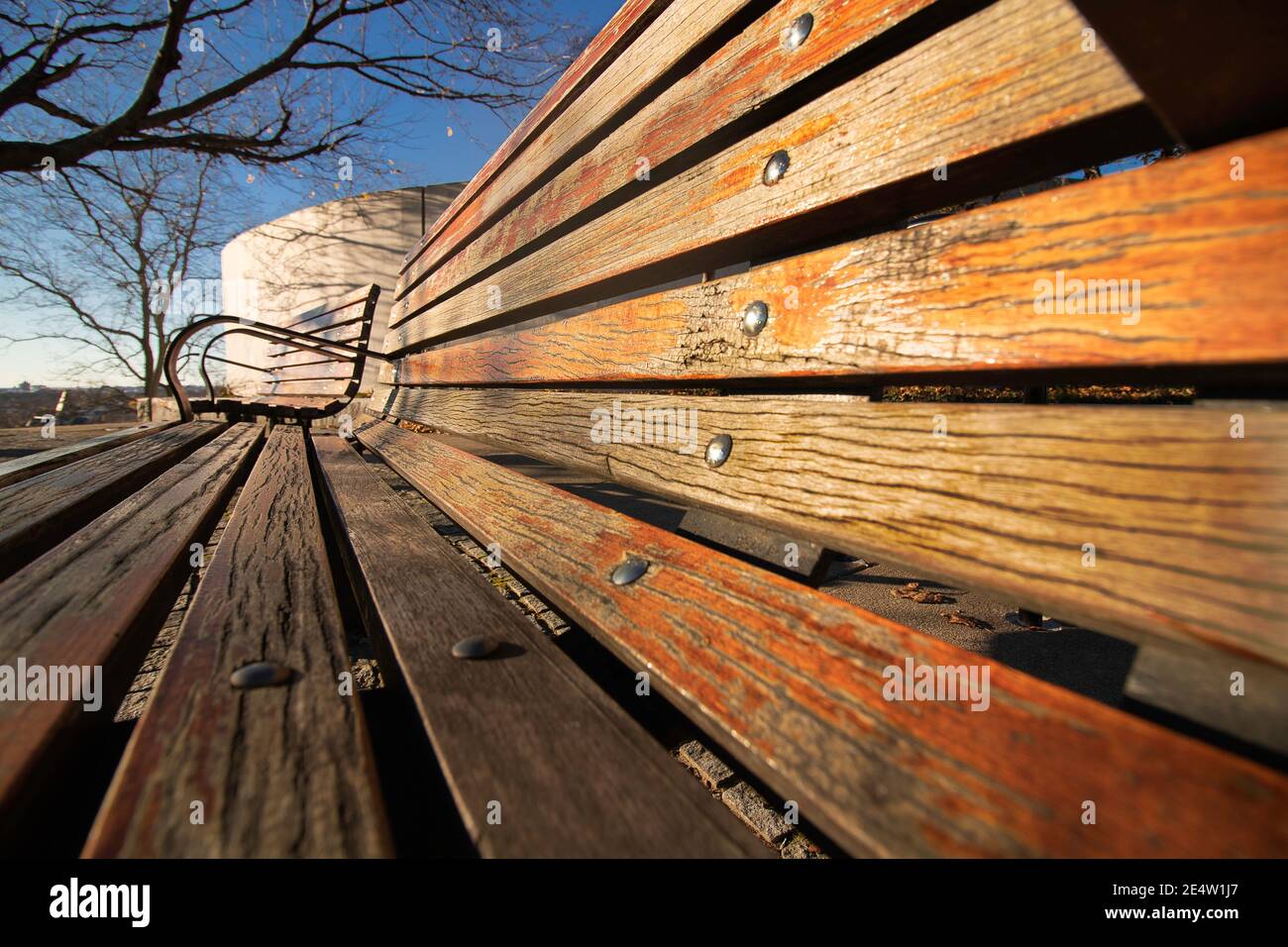 Closeup photo of a weathered park bench Stock Photo - Alamy