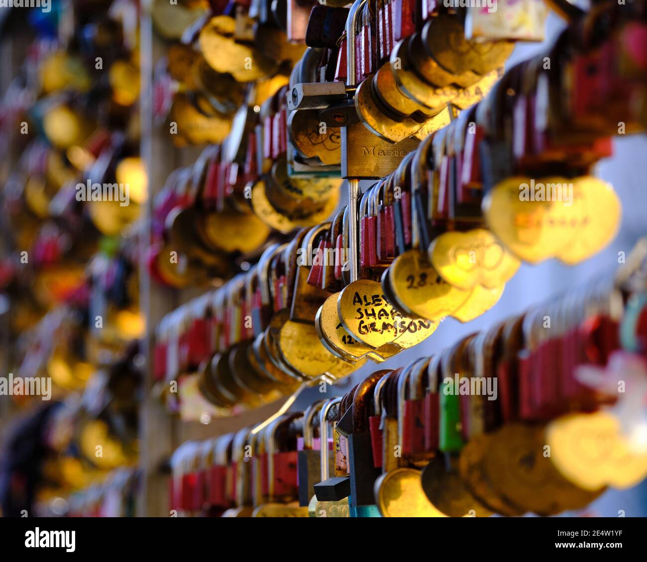 Locks put on bridge railing a as a symbol of Love and Union in ...