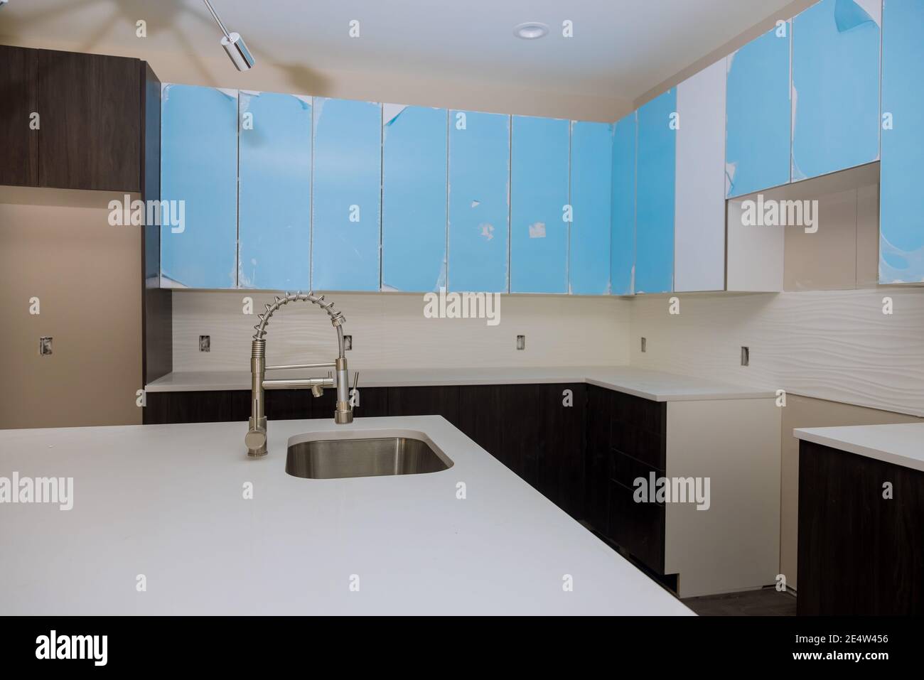 New cabinet in a home improvement kitchen view installed of ...