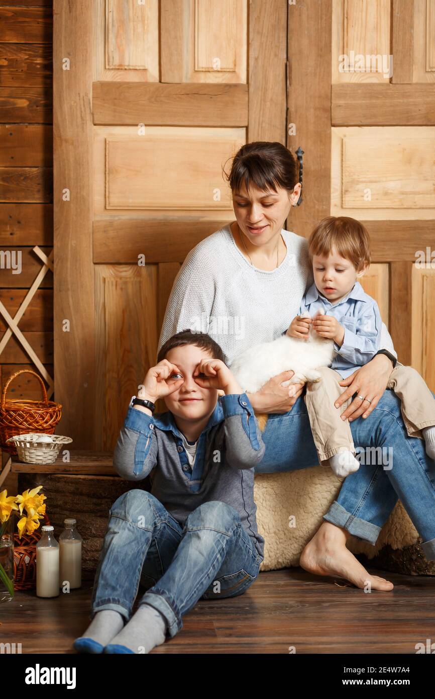 Beautiful family outdoor at wooden country house. Country style Stock ...