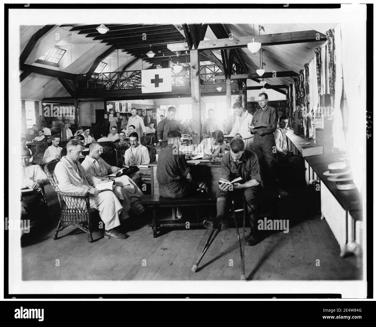 Men reading in war library service section, Red Cross Building, Walter ...