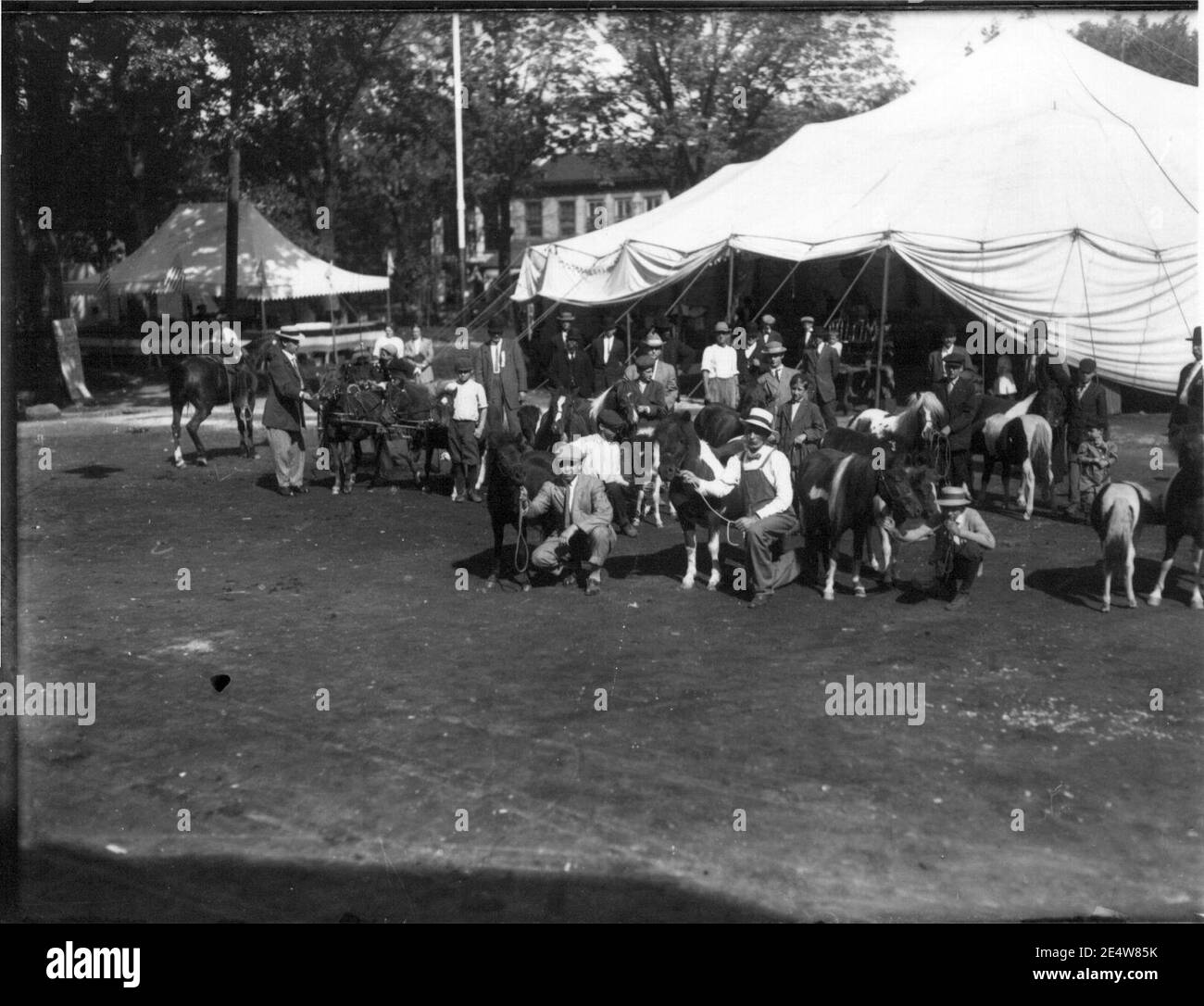 Men with ponies at Oxford Street Fair ca. 1912 (3199638029 Stock Photo ...