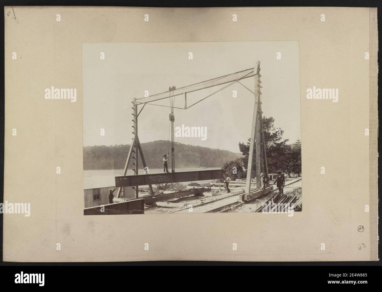 Men working with pulley system to move iron beams used for Hawkesbury ...
