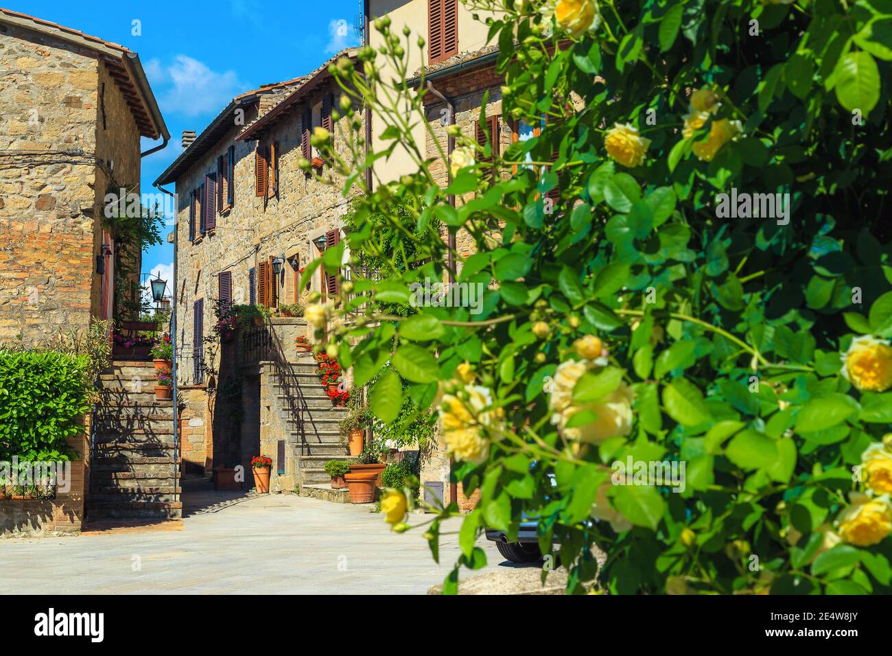 Cozy streets with flowery entrances and rustic stone houses ...