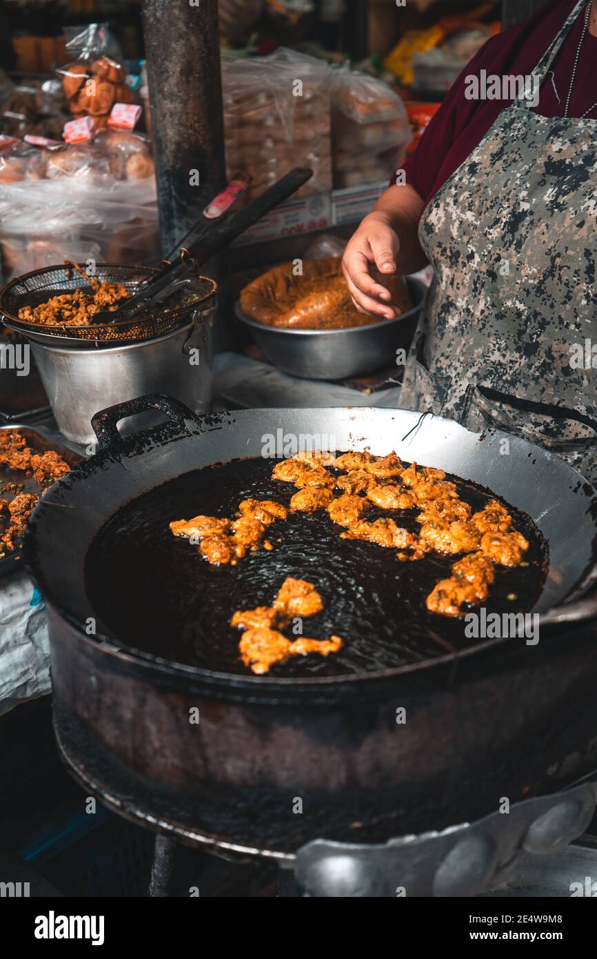 Fried Fish Cake In the oil pan at the market Stock Photo - Alamy