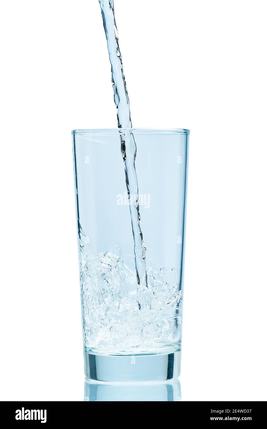 Pouring water. Pouring fresh clean drinking water to glass. isolated on ...