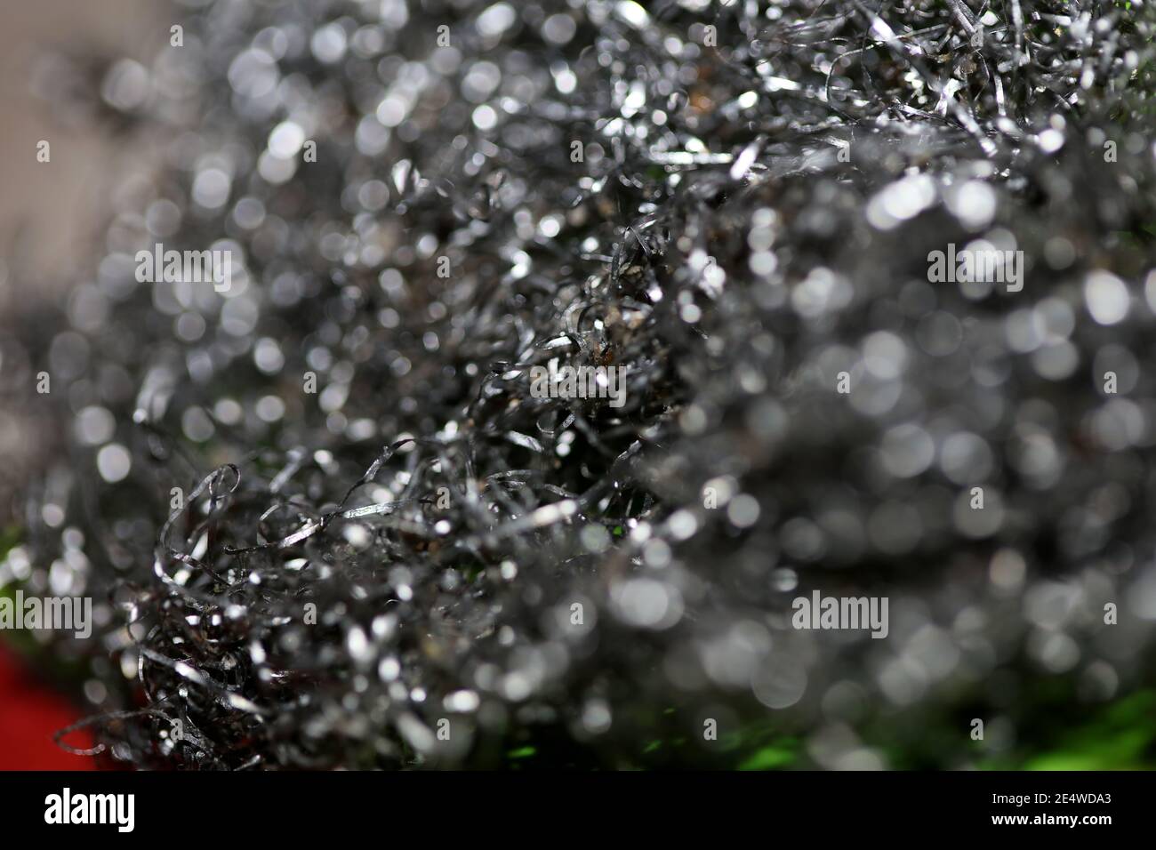 Metal wire dish cleaner macro modern high quality print Stock Photo - Alamy