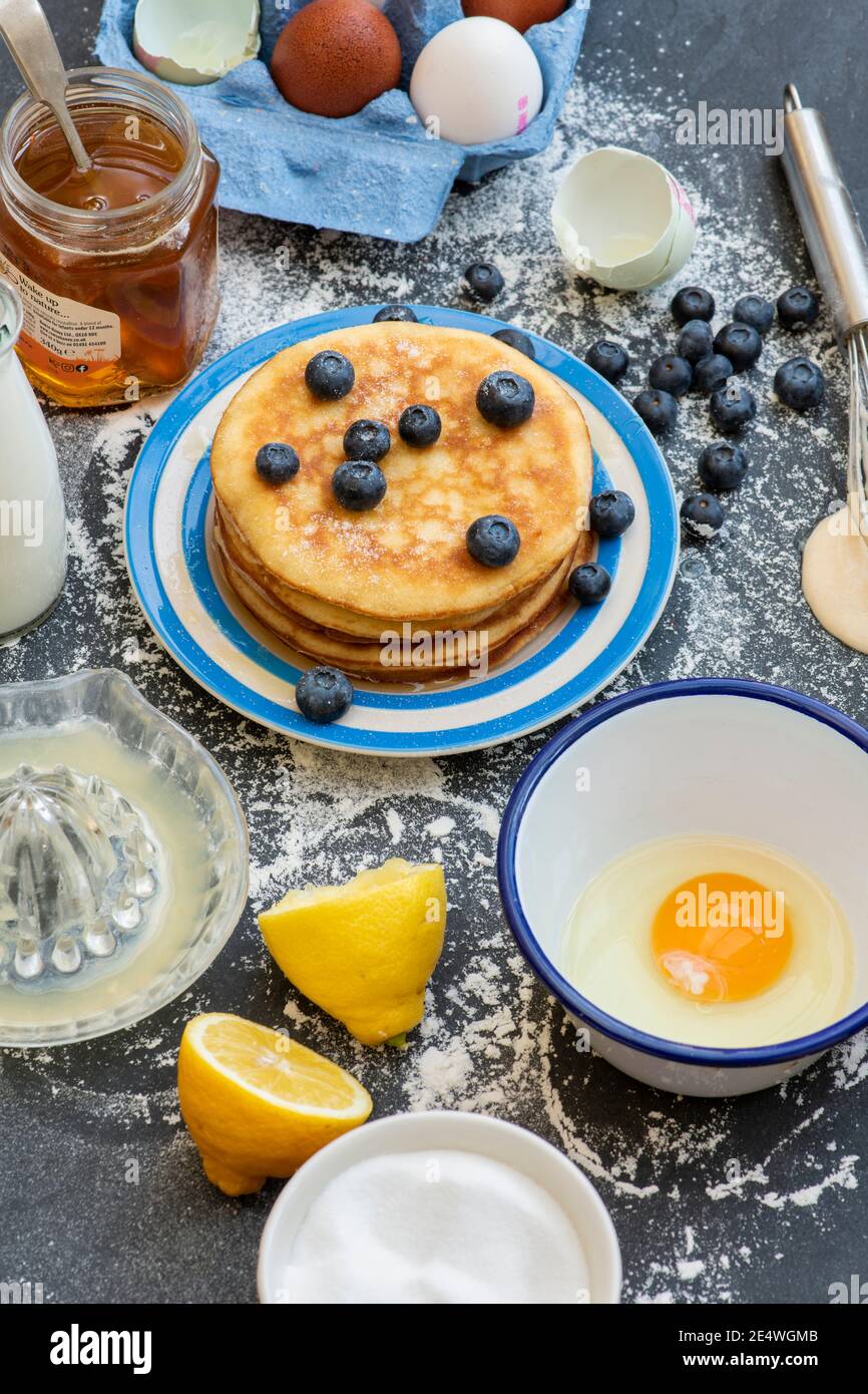 American pancakes and ingredients on a slate background Stock Photo - Alamy