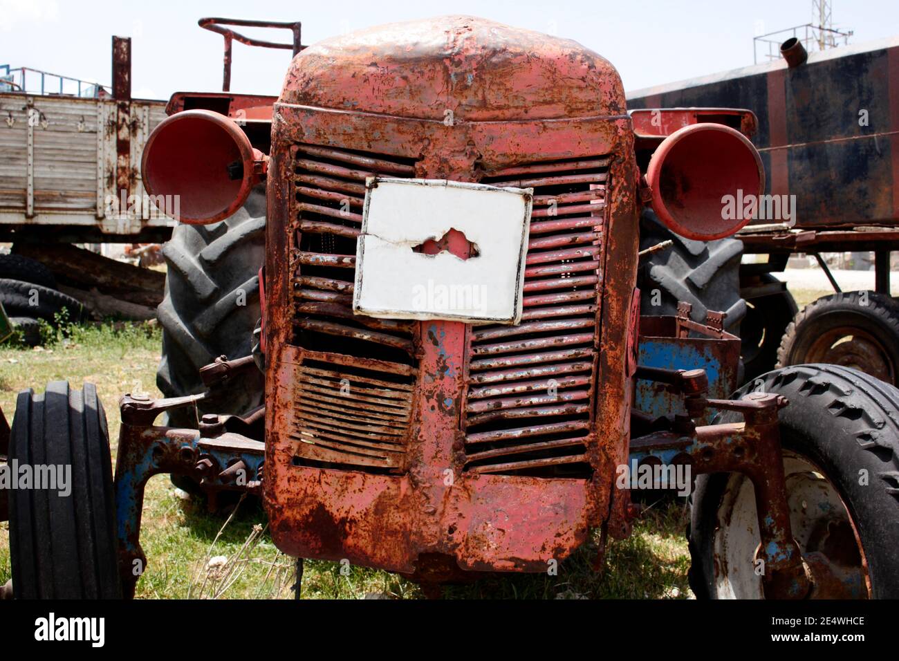 Old rusty tractor in junkyard hi-res stock photography and images - Alamy