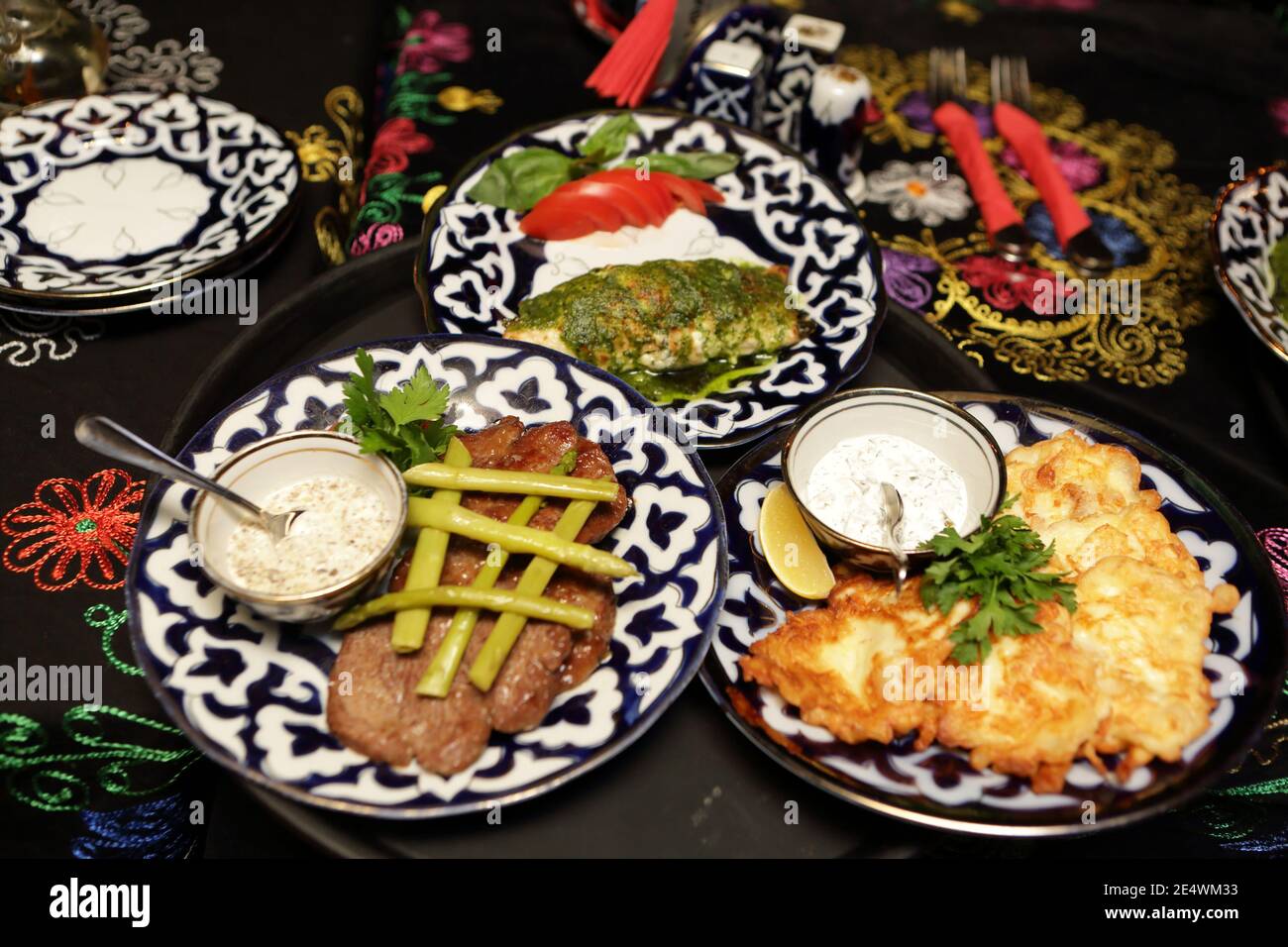 Various dish on the plates in the uzbek restaurant Stock Photo - Alamy