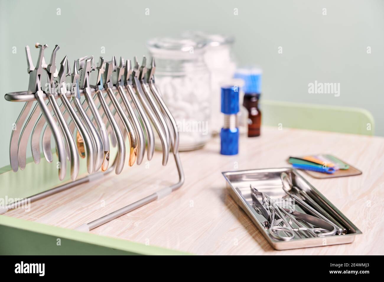 Set of various stainless steel instruments for braces and dental ...