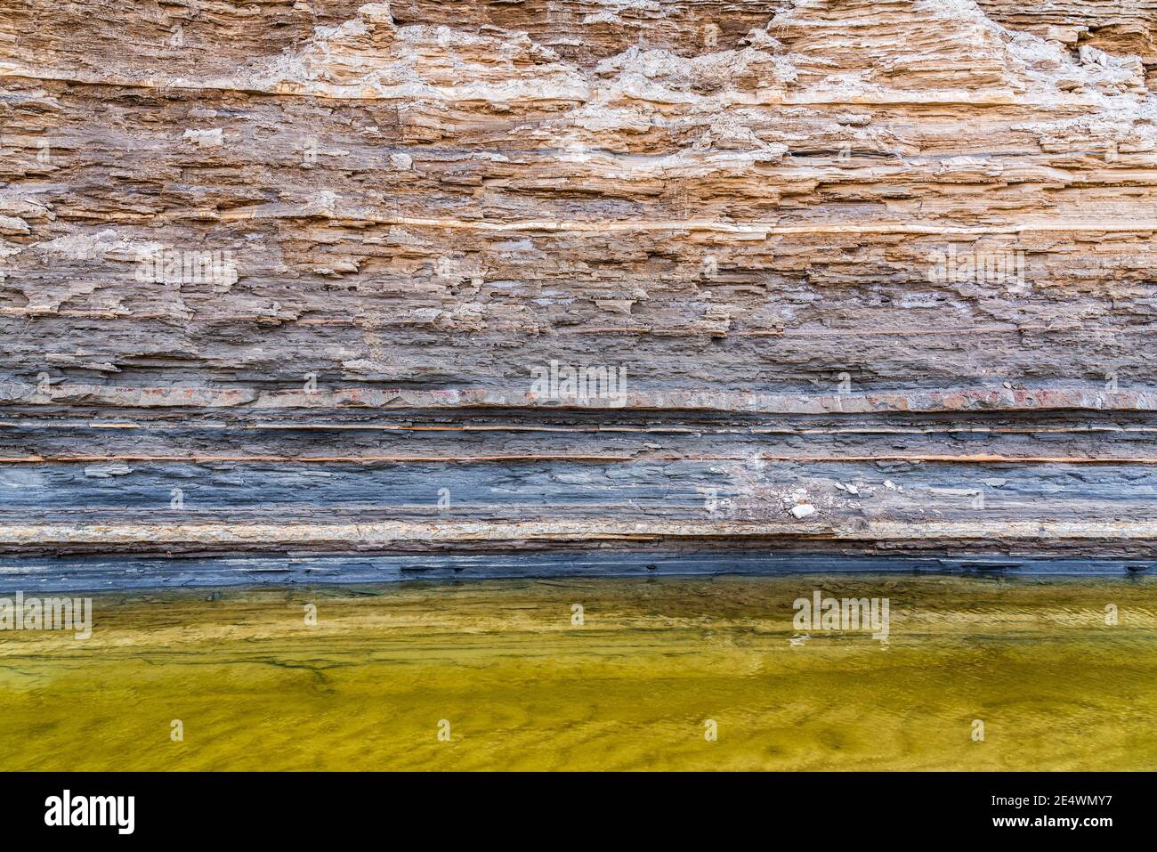 Rock layers above small mountain river Stock Photo - Alamy