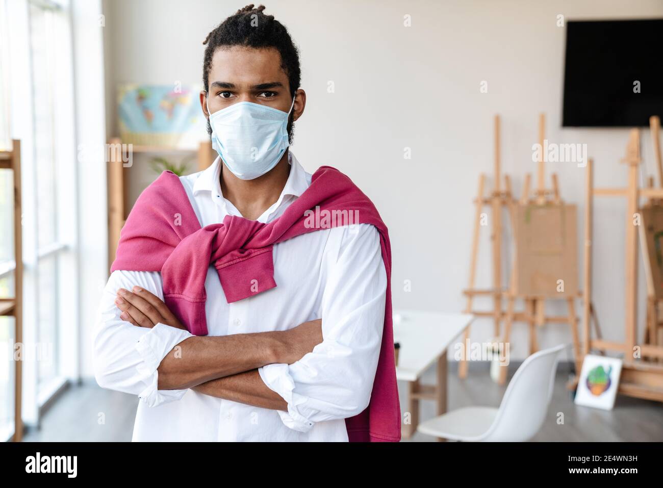Young guy face mask dreadlocks hi-res stock photography and images - Alamy