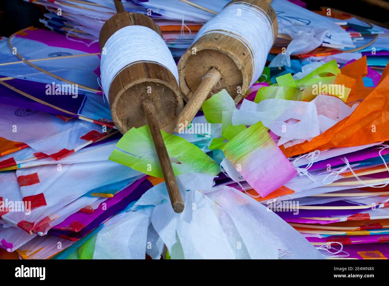 Colored paper kites and latai (Knitting reel Stock Photo - Alamy