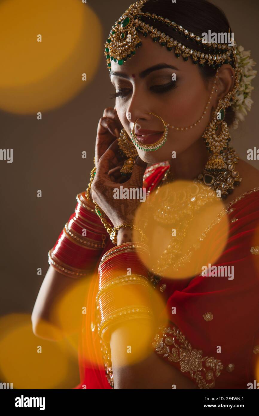 Earing hi-res stock photography and images - Alamy