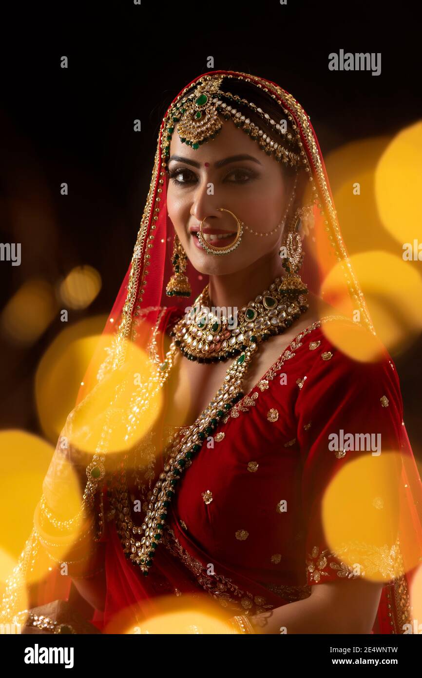 India earing portrait hi-res stock photography and images - Alamy