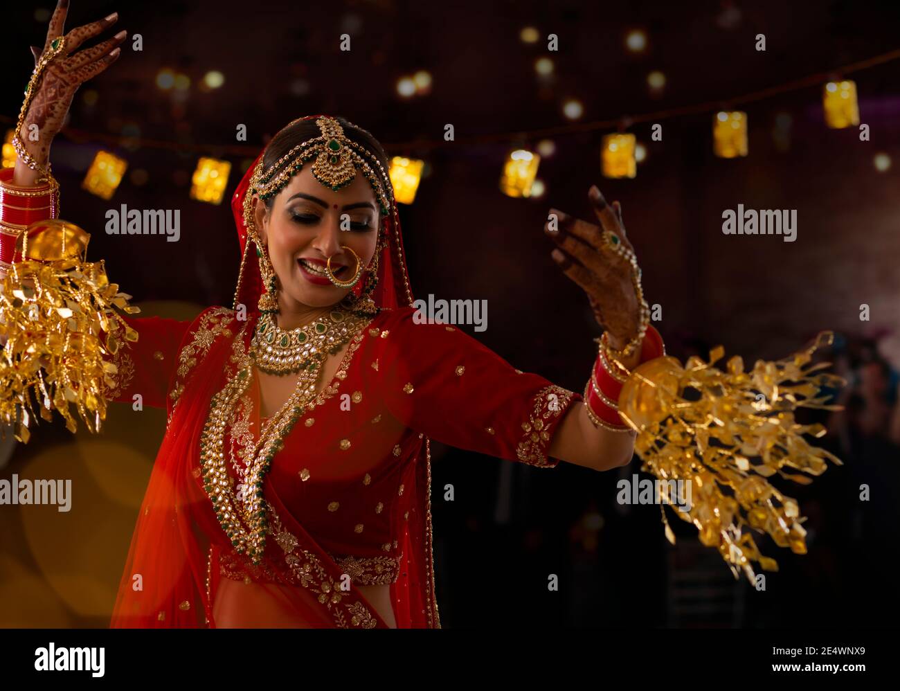 Indian bride dancing at her wedding Stock Photo - Alamy