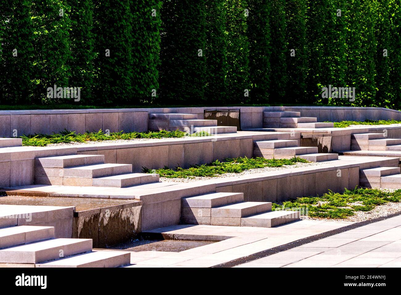 Rounded diagonal terraces on a slope in a modern city park Stock Photo ...