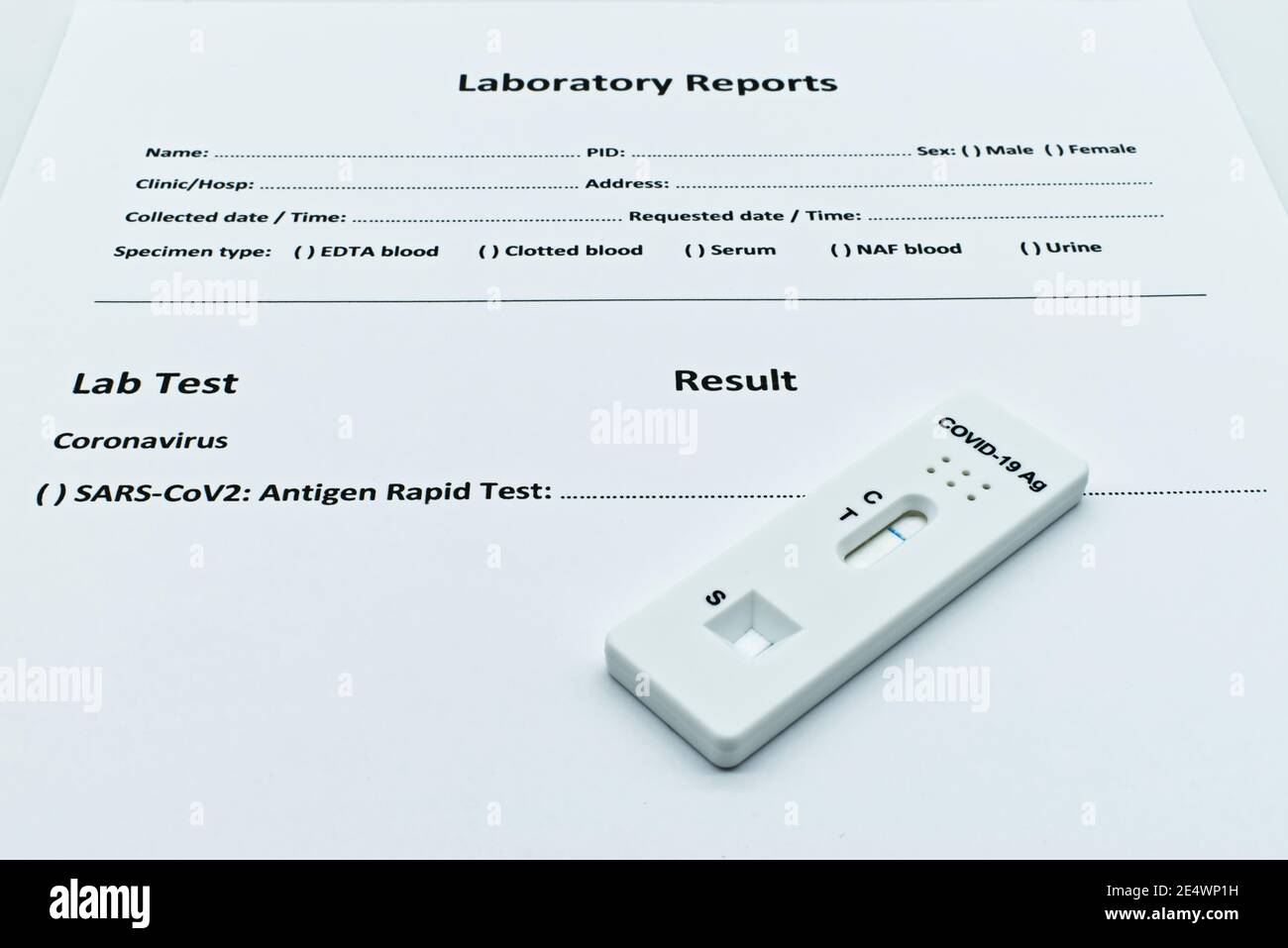 Covid-19 antigen rapid test device on a Report Module, isolated on ...
