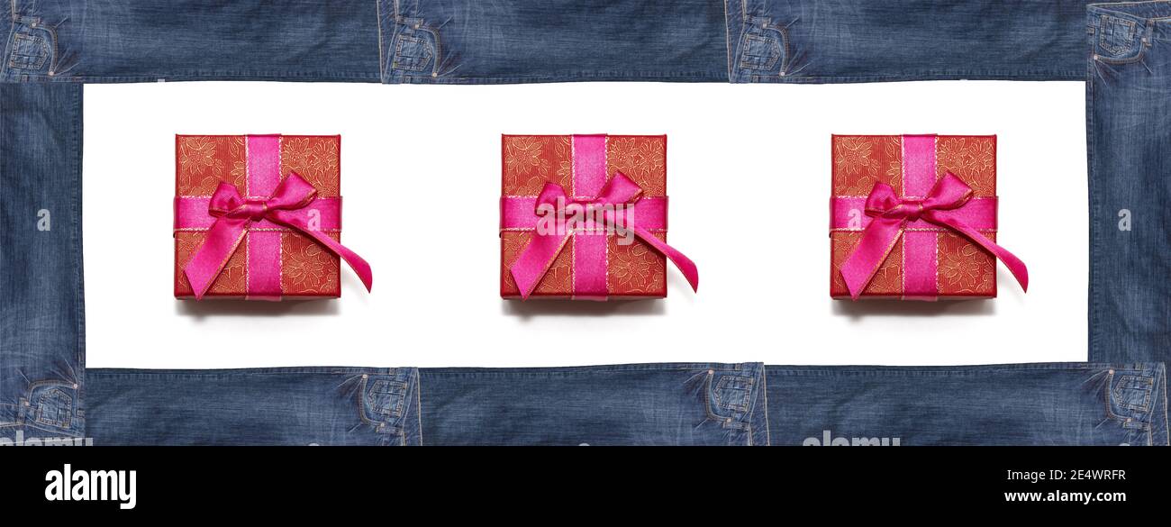 Red gift boxes enclosed within rectangular frame made of dark blue ...