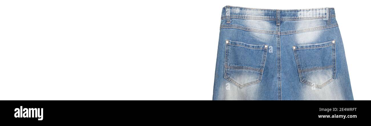 Waist and back pockets part of light blue jeans with faded white spots ...