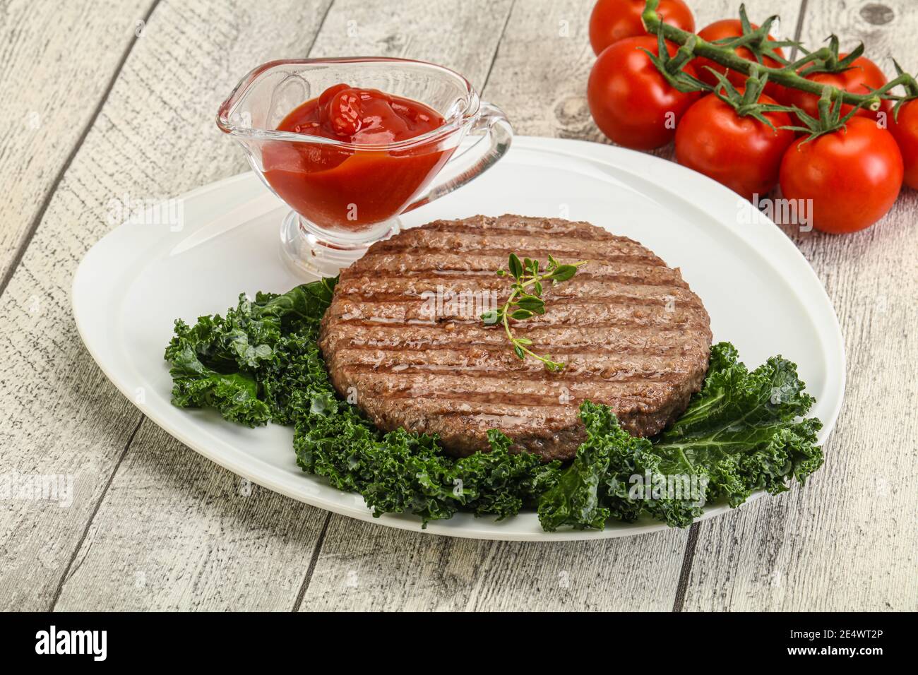 Grilled tasty beef cutlet for burger Stock Photo - Alamy