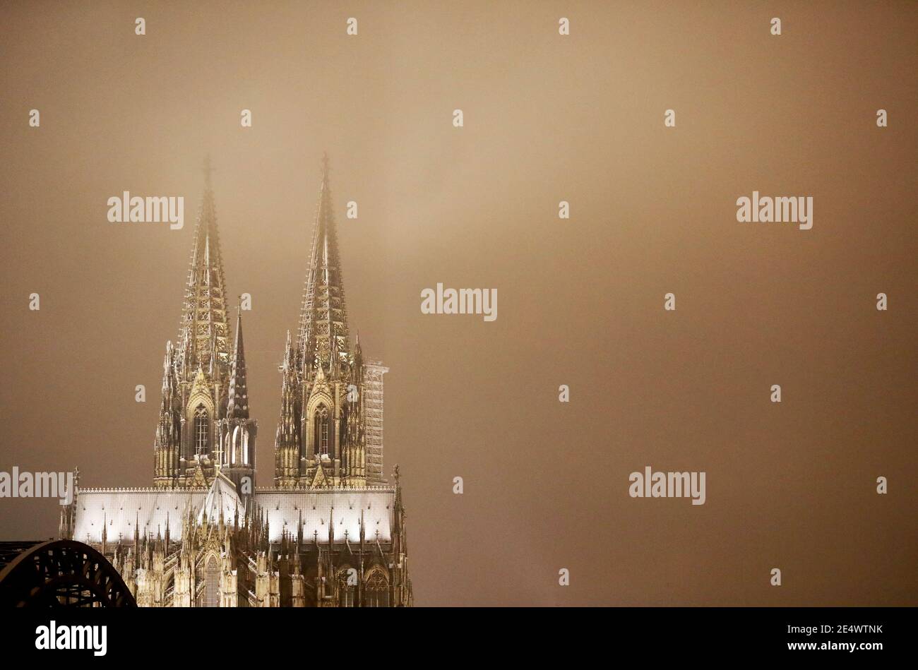 Cologne, Germany. 25th Jan, 2021. A thin layer of snow lies on the roof ...