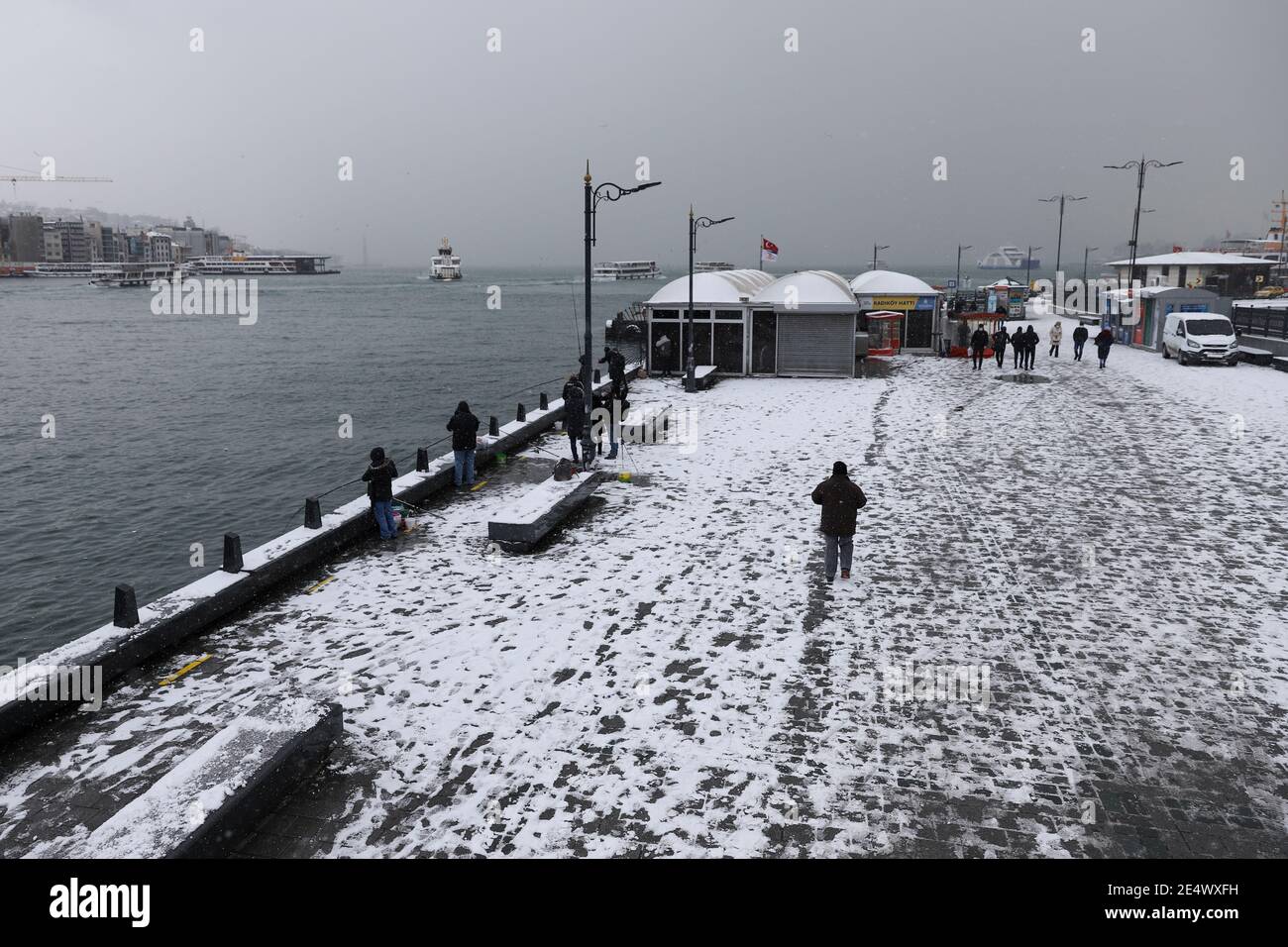 ISTANBUL, TURKEY - JANUARY 18, 2021: Snowy street in Eminonu District ...